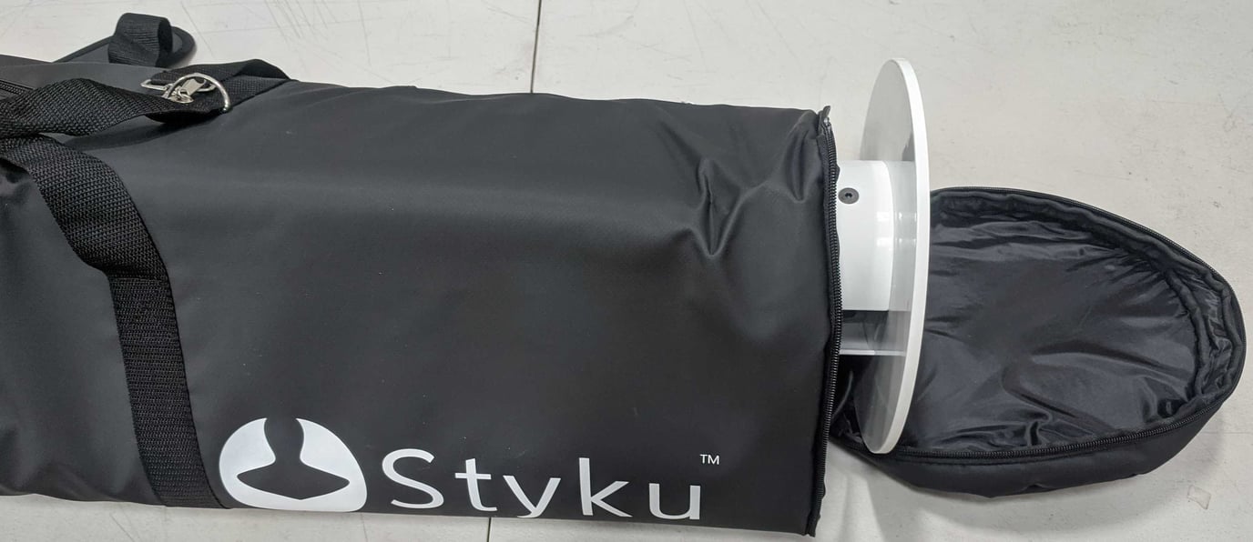 How do I put my Styku tower inside the Travel Kit?